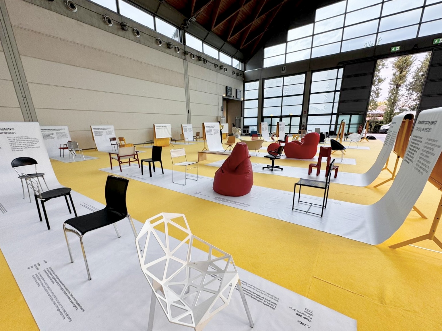 A selection of iconic Alias chairs at the centre of the “La sedia ...